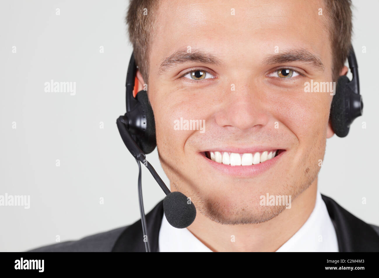 Customer support operator woman smiling isolated Stock Photo - Alamy