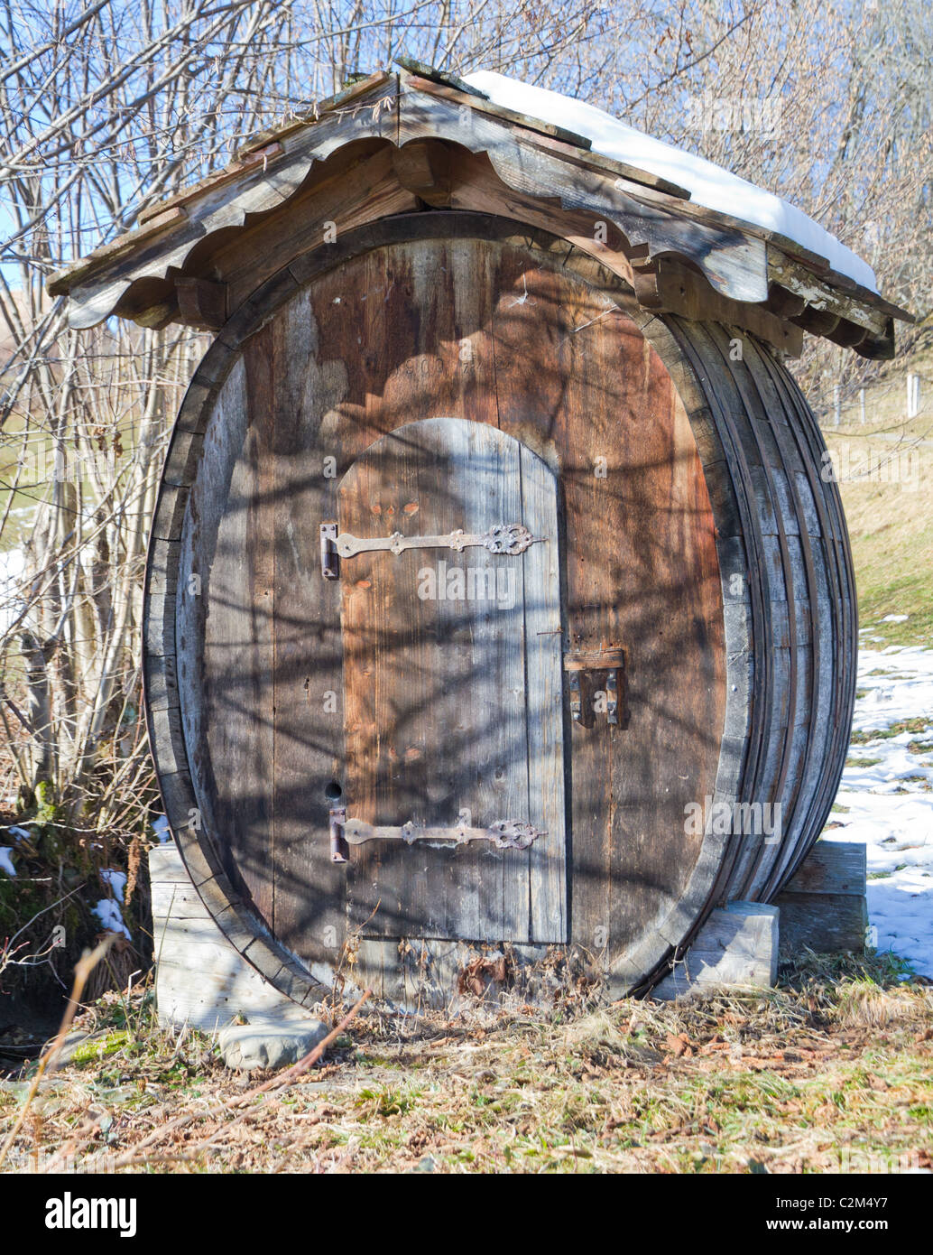 tiny hobbit cabin or shed built in large wooden barrel Stock Photo - Alamy