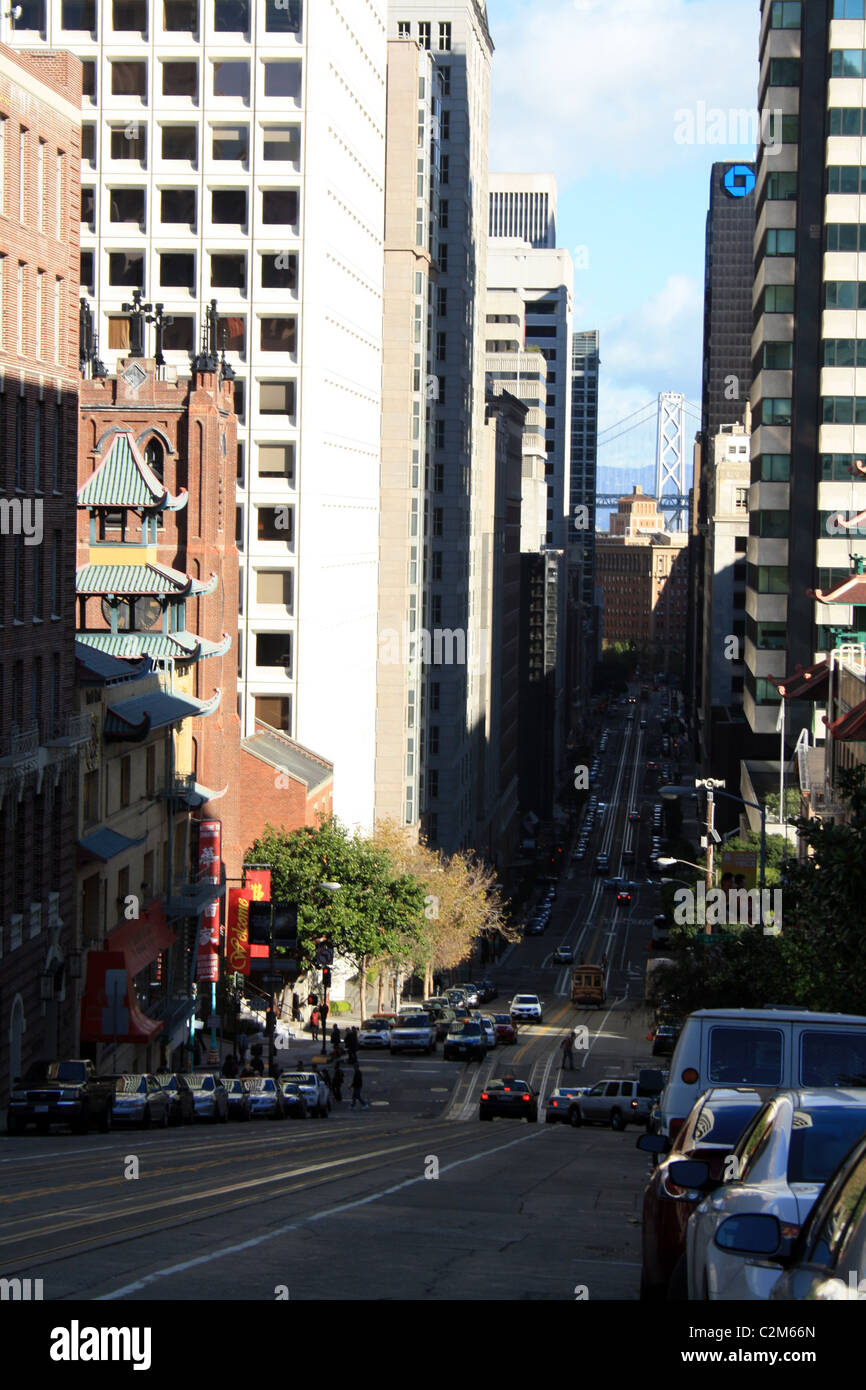 STEEP ROAD IN CHINATOWN & BAY BRIDGE SAN FRANCISCO USA 10 November 2010 ...