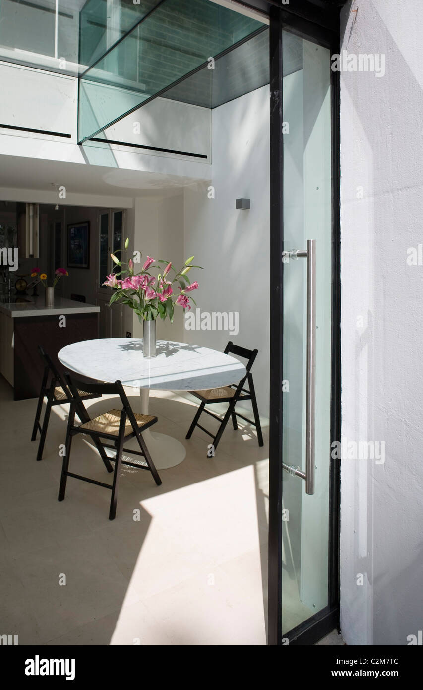 Glass extension, rear entrance Stock Photo - Alamy