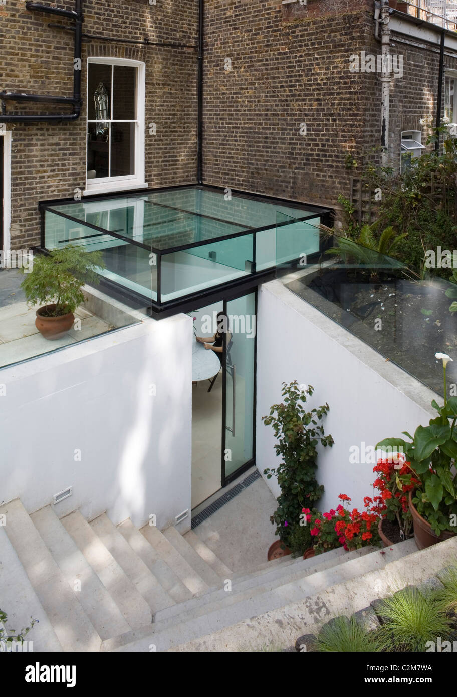 Glass extension, rear entrance Stock Photo - Alamy