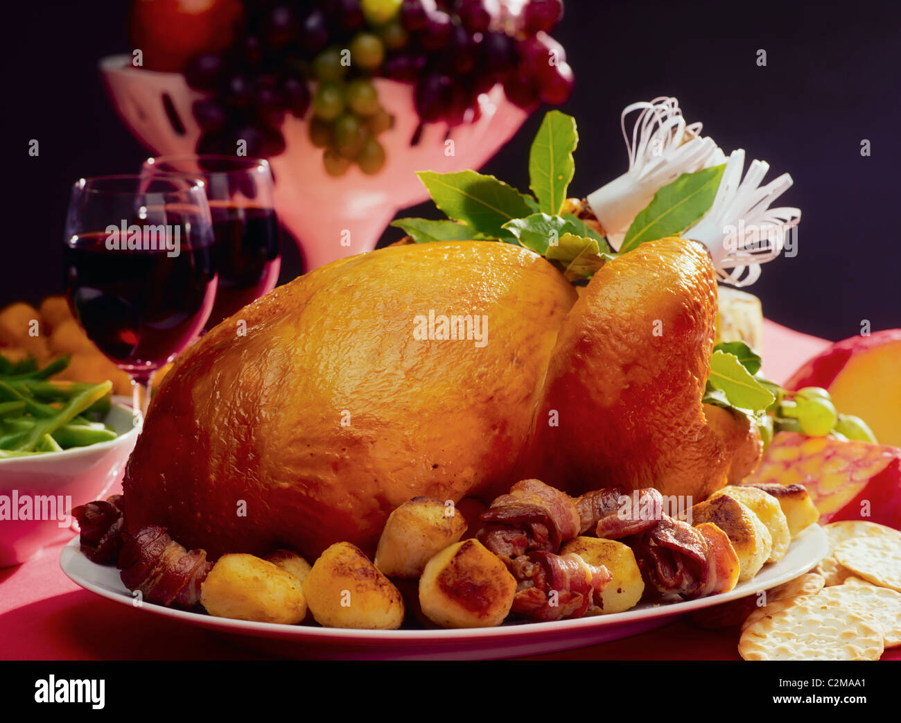 Roast Turkey With Potatoes Stock Photo - Alamy