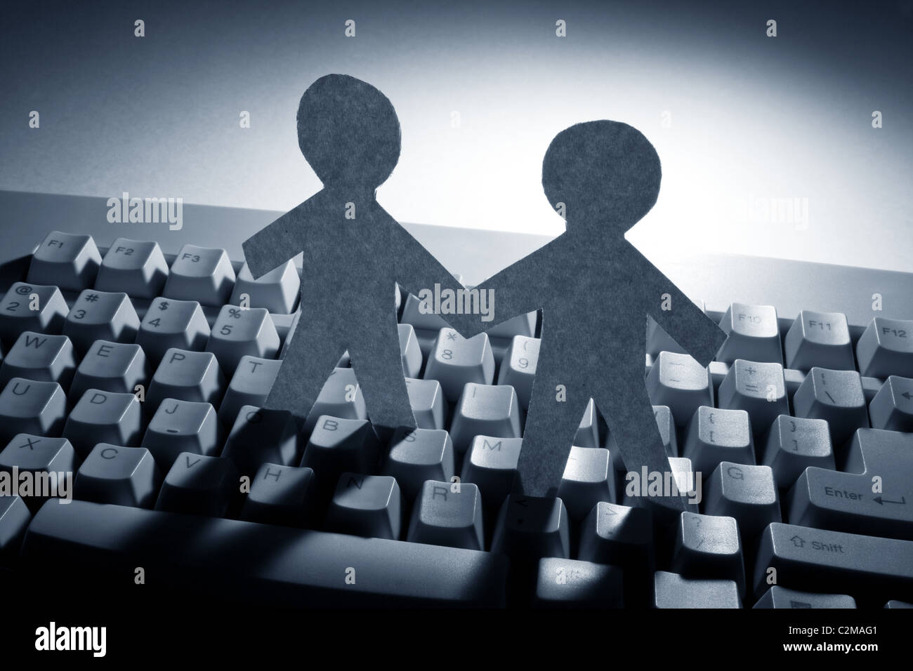 Paper Chain Men, concept of Friendship Stock Photo - Alamy