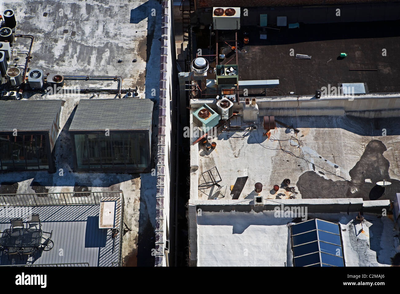 Urban rooftops in the hot summer heat with rooftops and brick buildings ...