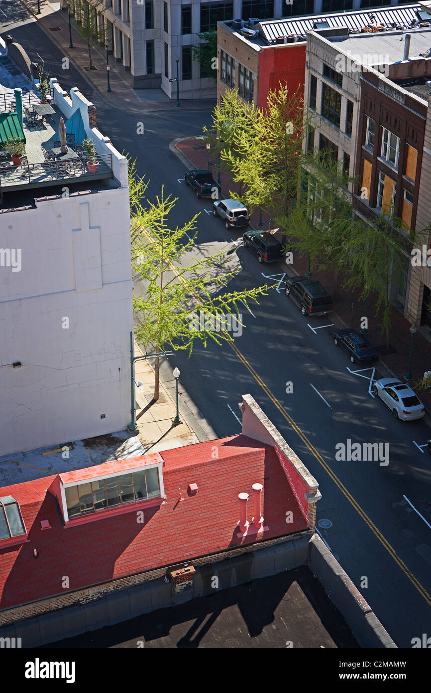 Urban rooftops in the hot summer heat with rooftops and brick buildings ...