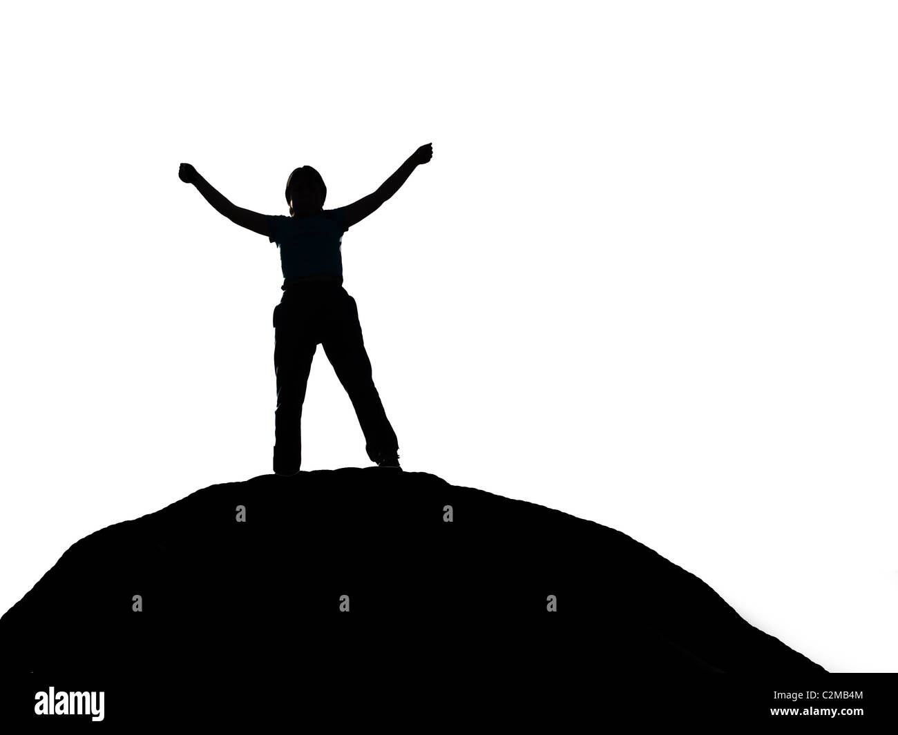 Backlit of a person by lifting the arm as a sign of victory Stock Photo ...