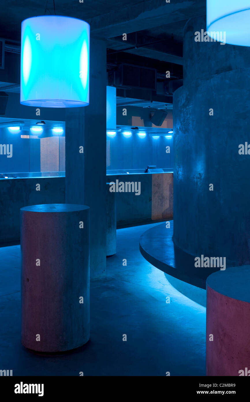 Matter, The O2 Arena, Peninsula Square, London. Concrete tables, walls ...