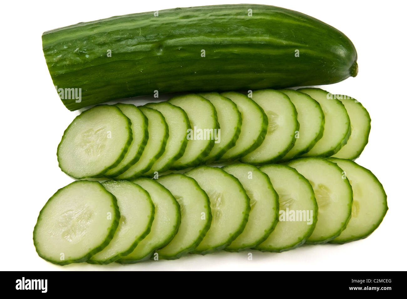 picture of two sliced lines and a half cucumber Stock Photo - Alamy