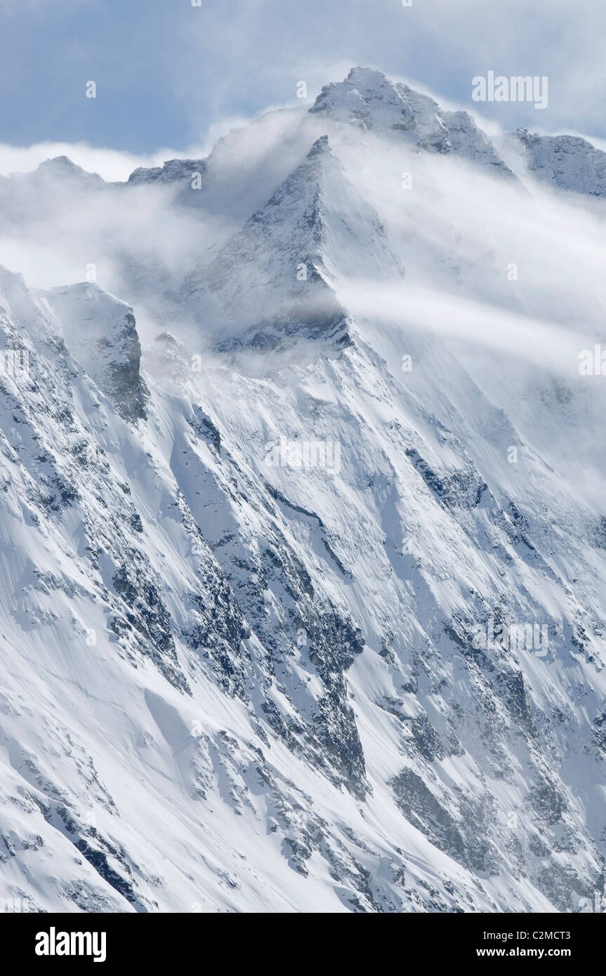 Mont Gele appearing from clearing storm clouds in the Central Valais ...