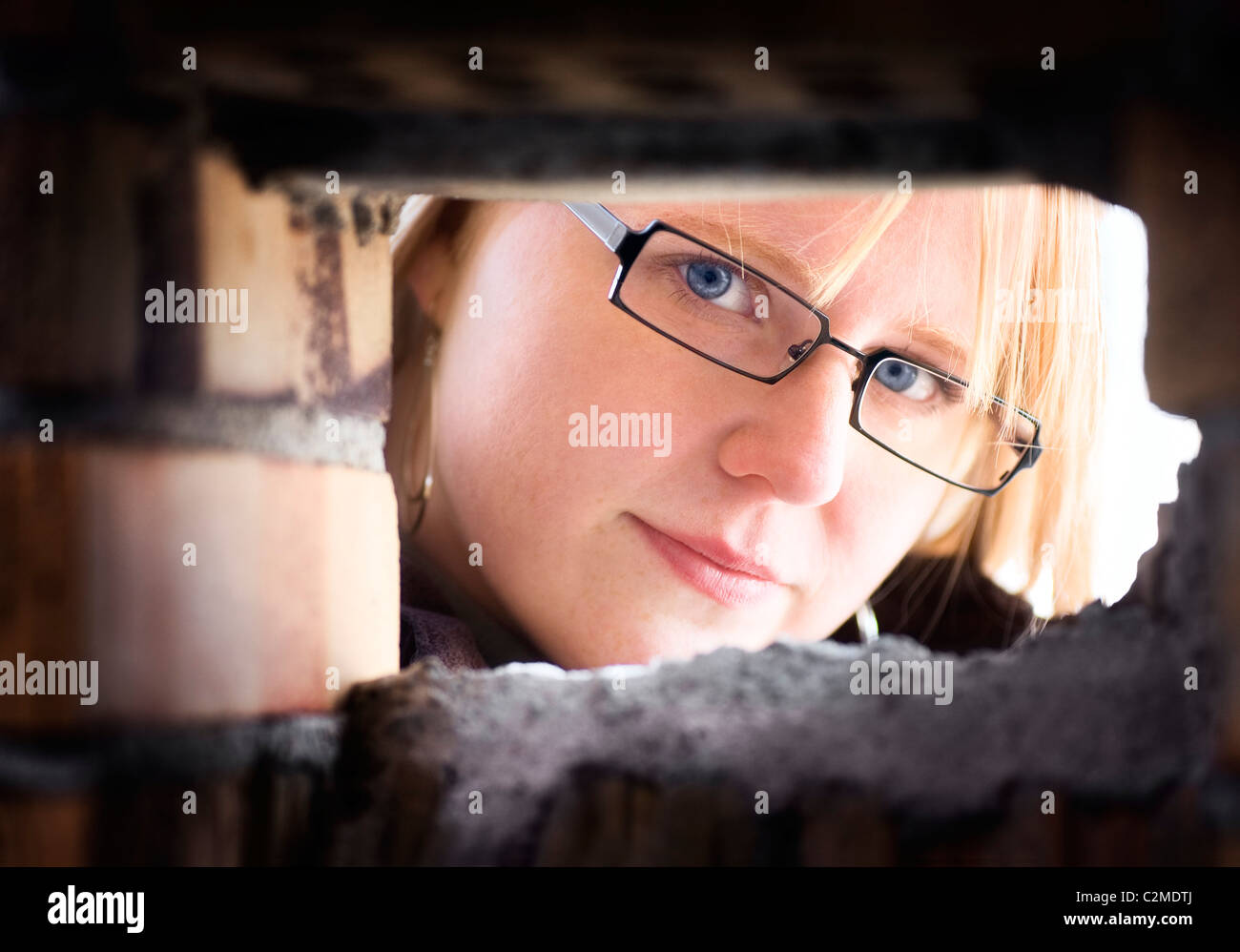 Watching through holes hi-res stock photography and images - Alamy