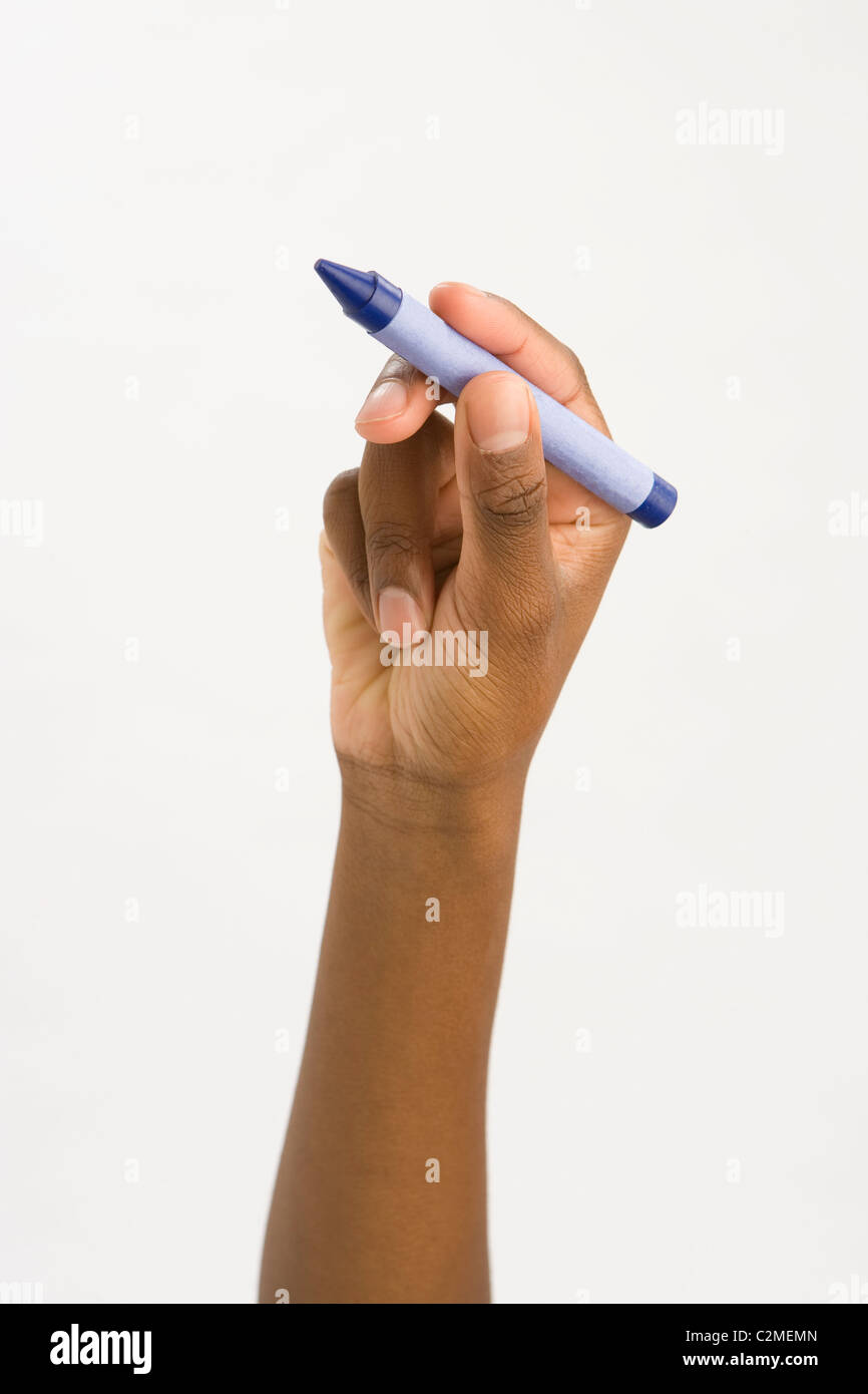 Hand Holding Crayon Coloring Stock Photos & Hand Holding Crayon ...