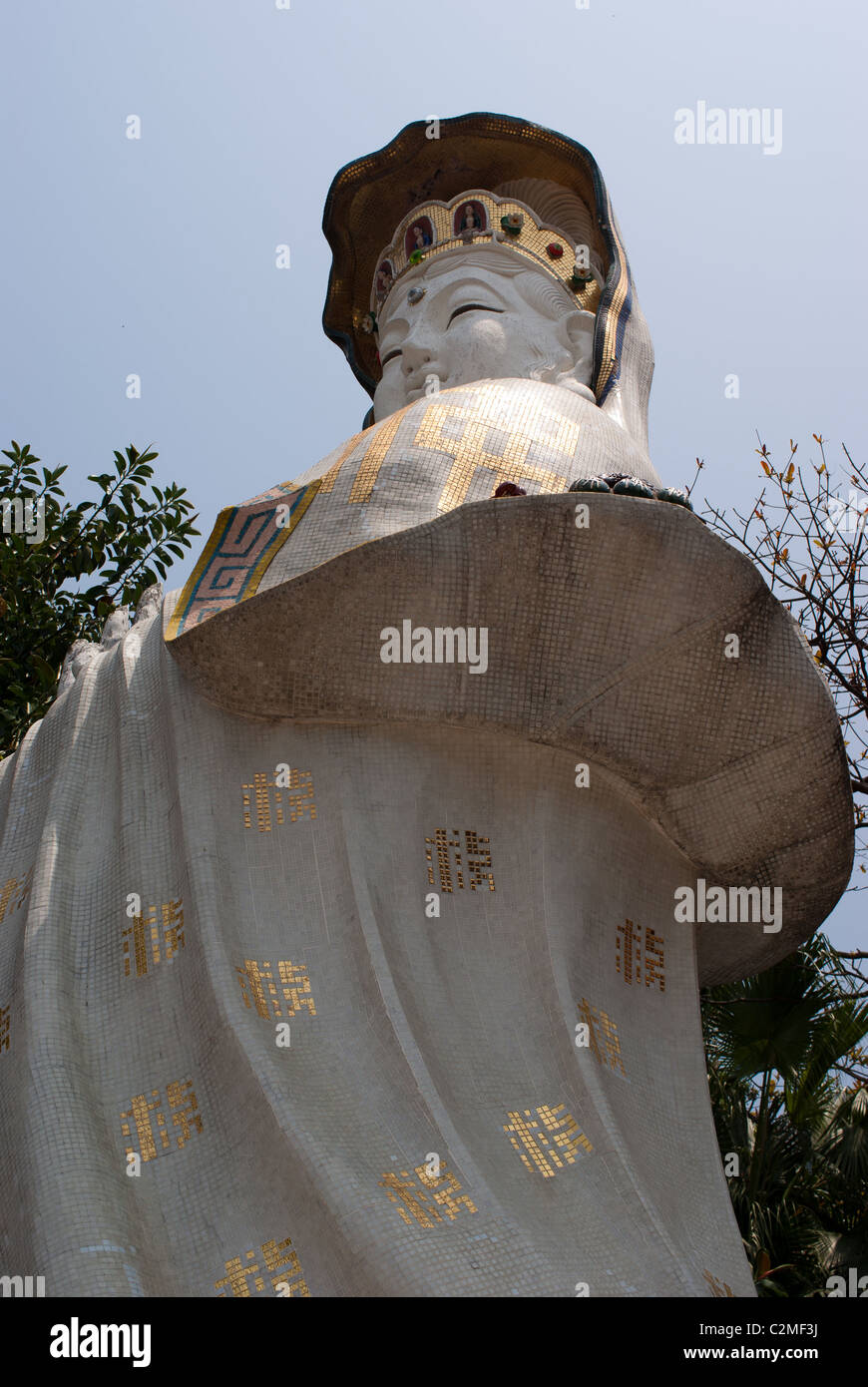 Standing lady Buddha marble statue in Hong Kong Stock Photo - Alamy