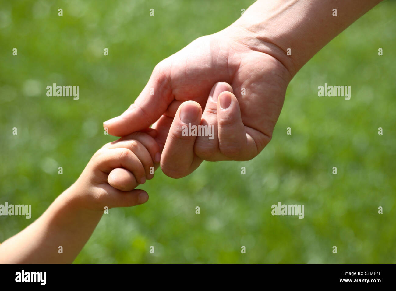 Child holding finger hi-res stock photography and images - Alamy