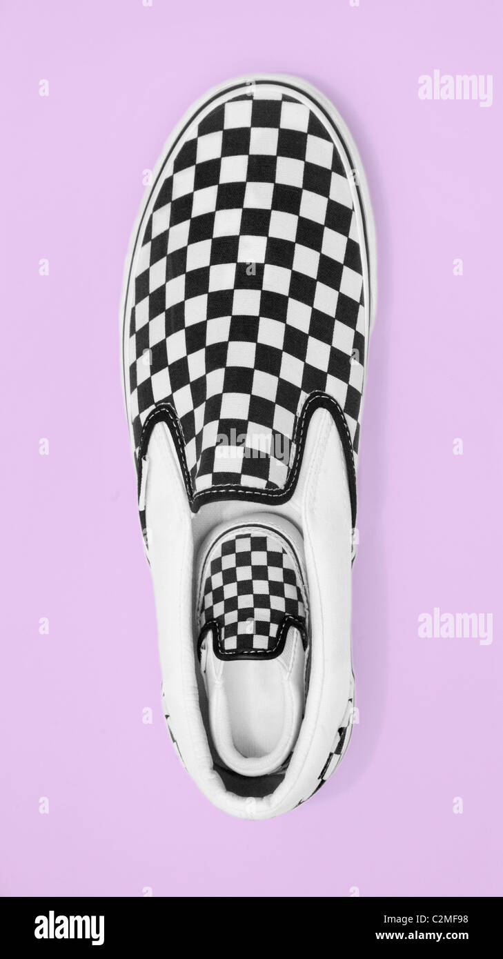 Baby's shoe inside their parent's identical shoe Stock Photo - Alamy