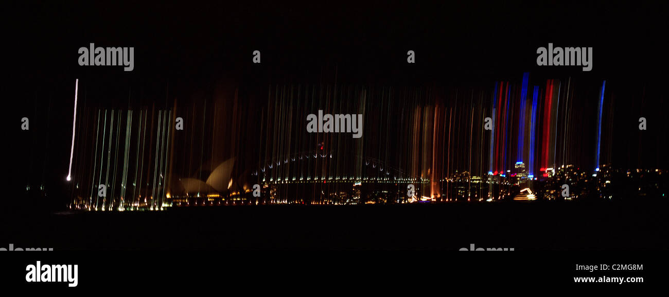 A Panoramic view of Sydney at night showing the Sydney Opera House and ...