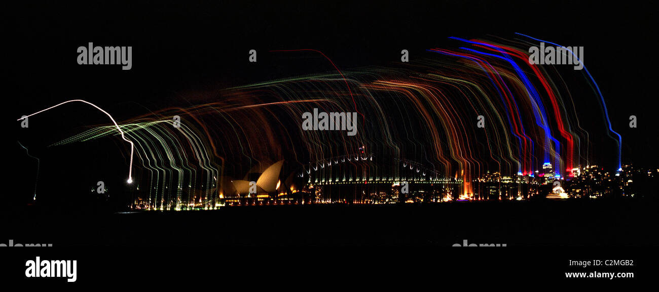 A Panoramic view of Sydney at night showing the Sydney Opera House and ...