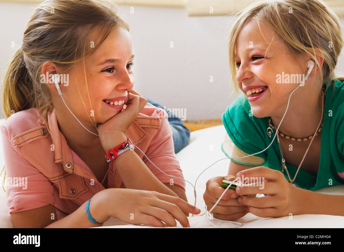 Girls Listening To Music Stock Photo - Alamy