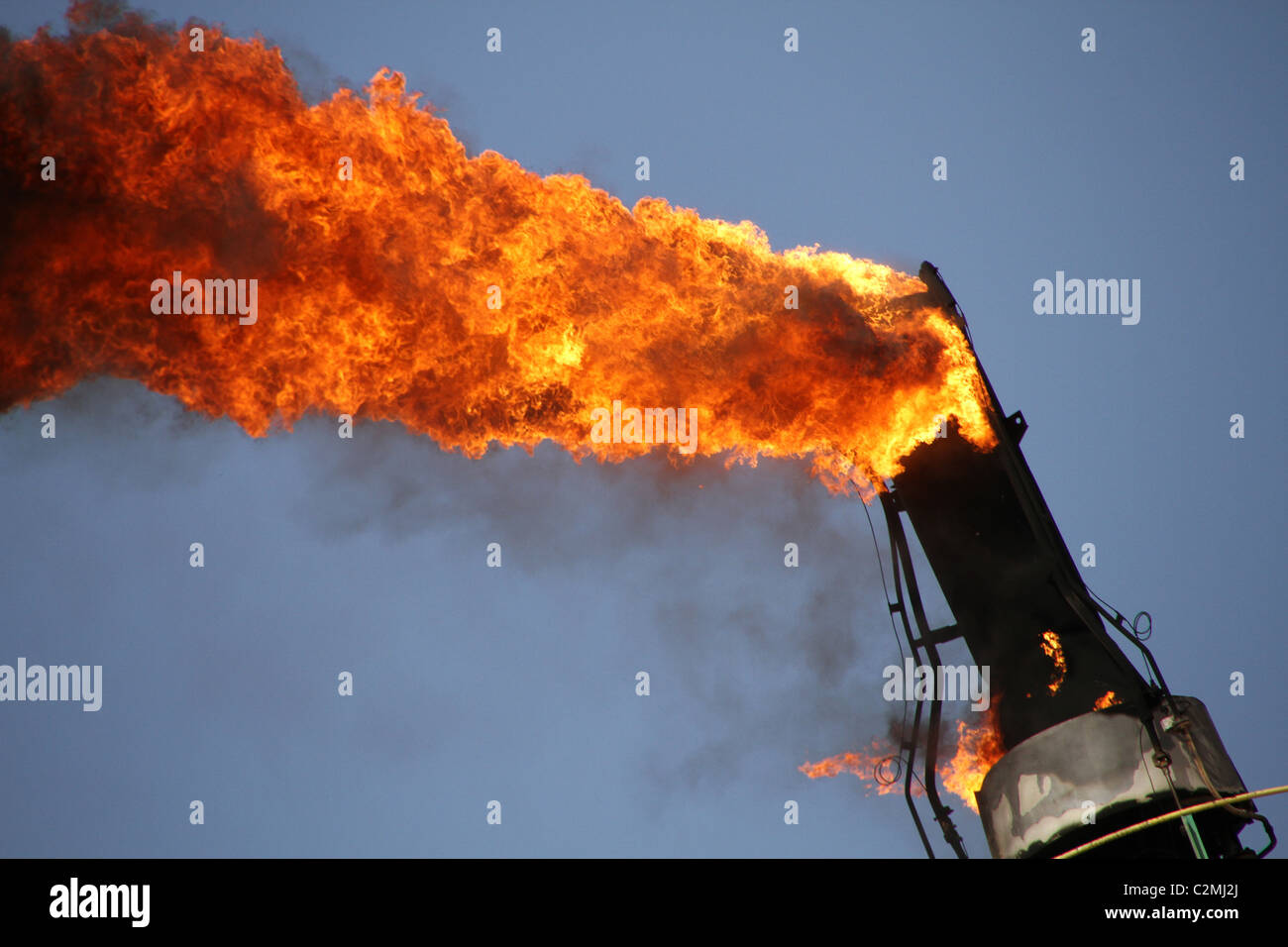 Huge flames leak from a gas pipe Stock Photo - Alamy