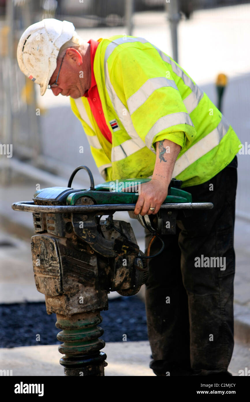 Hand compactor hi-res stock photography and images - Alamy