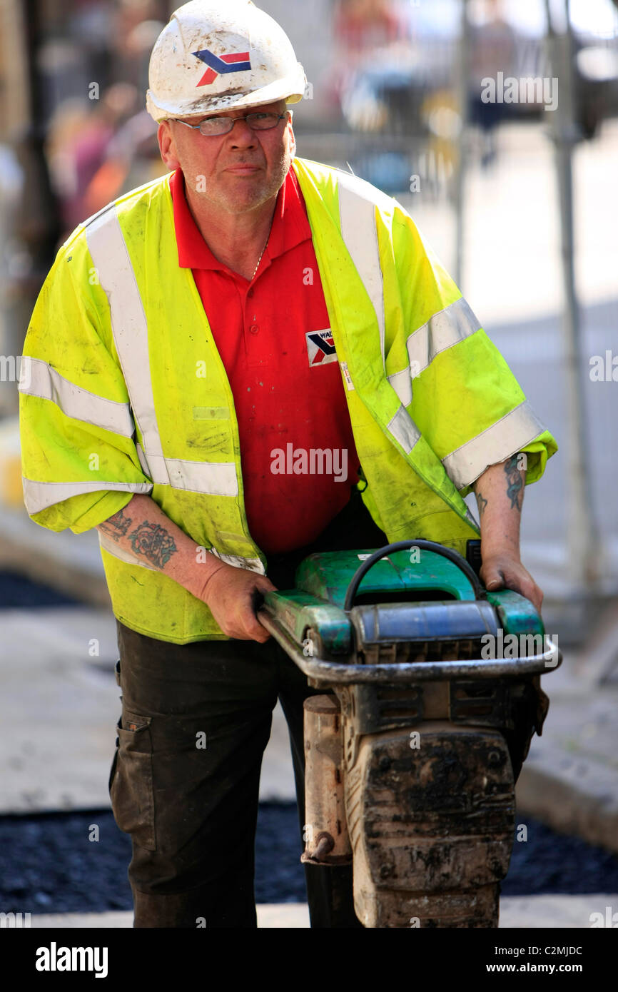 Hand compactor hi-res stock photography and images - Alamy