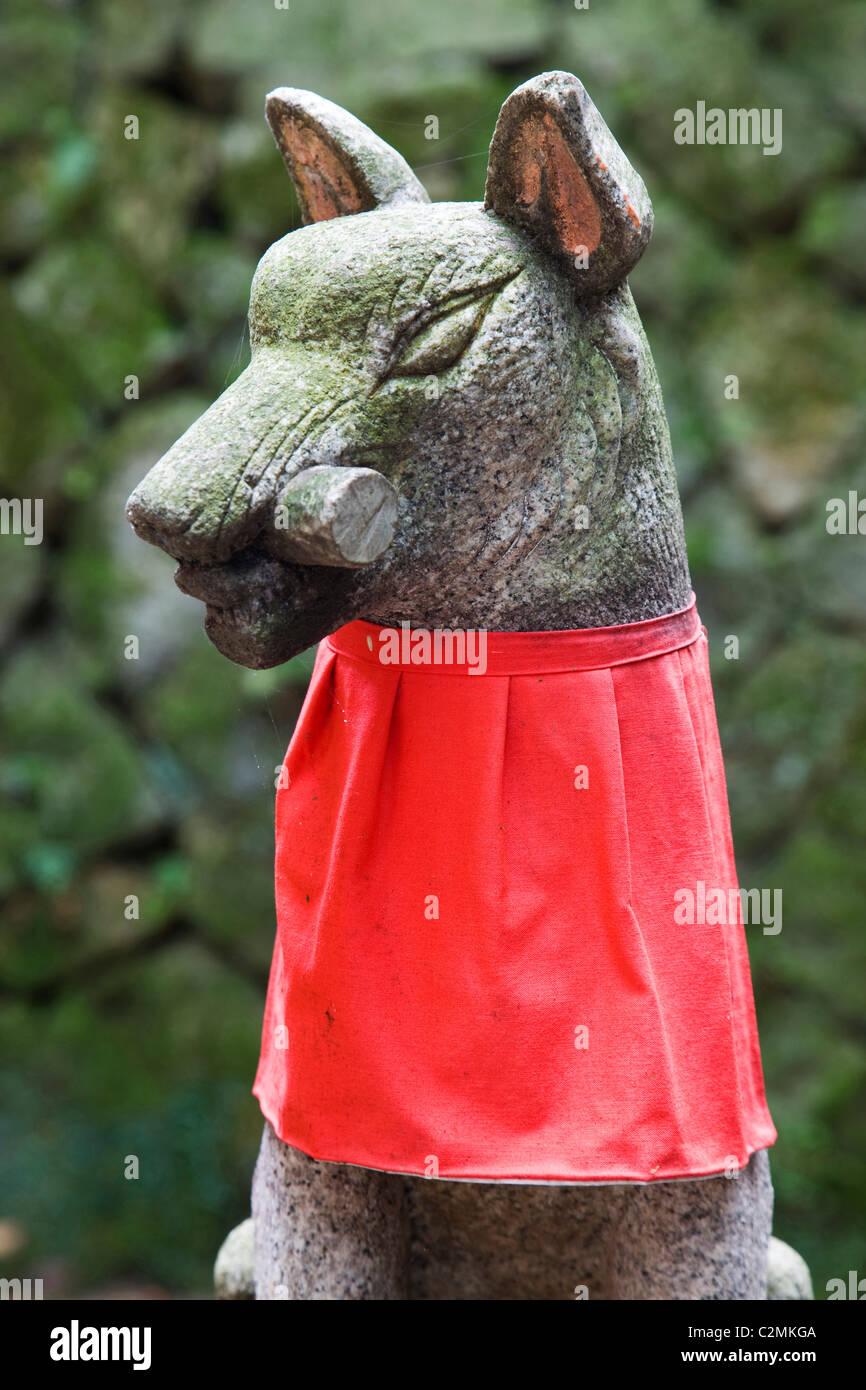 Kitsune or messenger foxes that are a symbol of wealth in Fushimi Inari ...