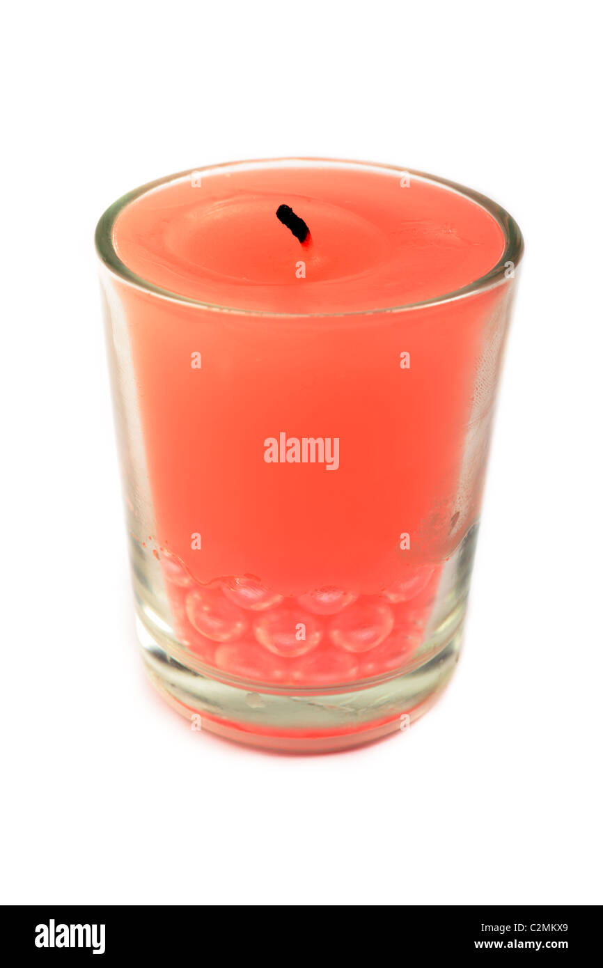 Red candle in glass isolated on white background Stock Photo - Alamy