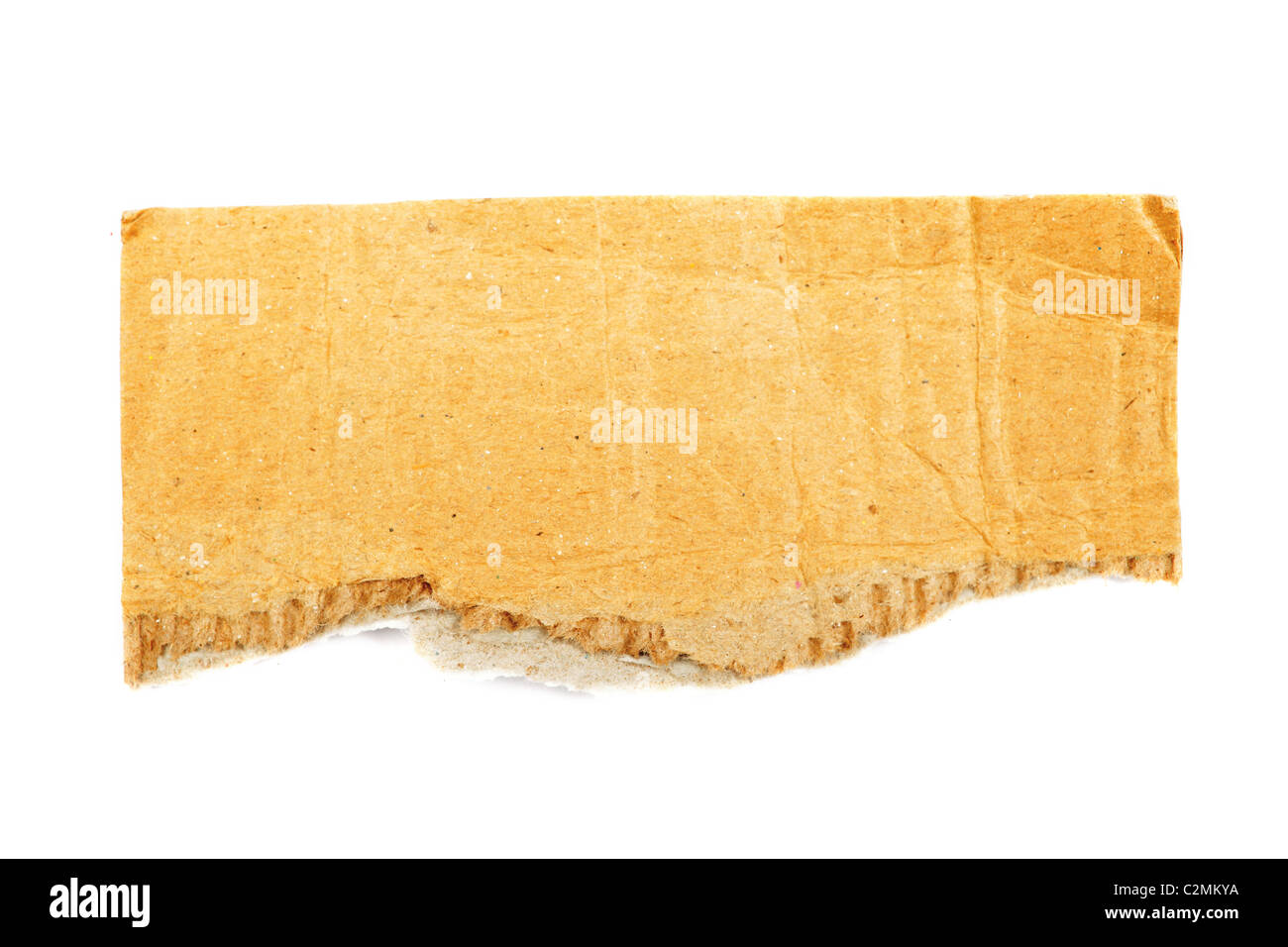 Torn cardboard isolated on white background. As textured background or ...