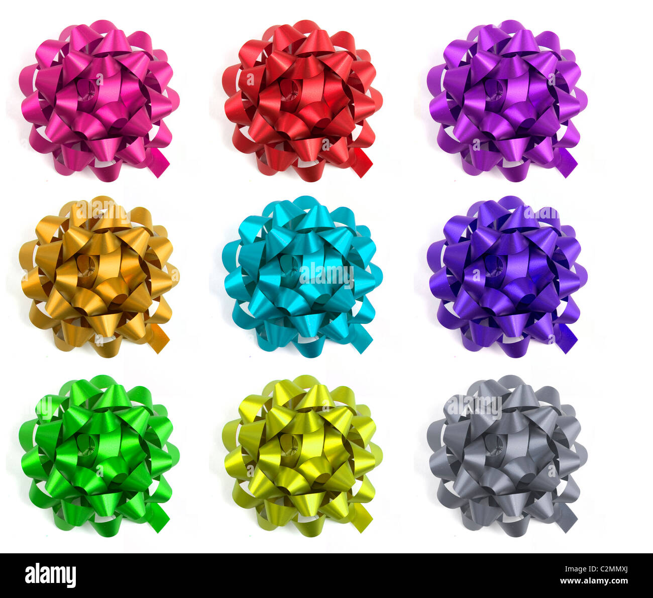 Nine different coloured nows made of ribbons isolated on white Stock ...
