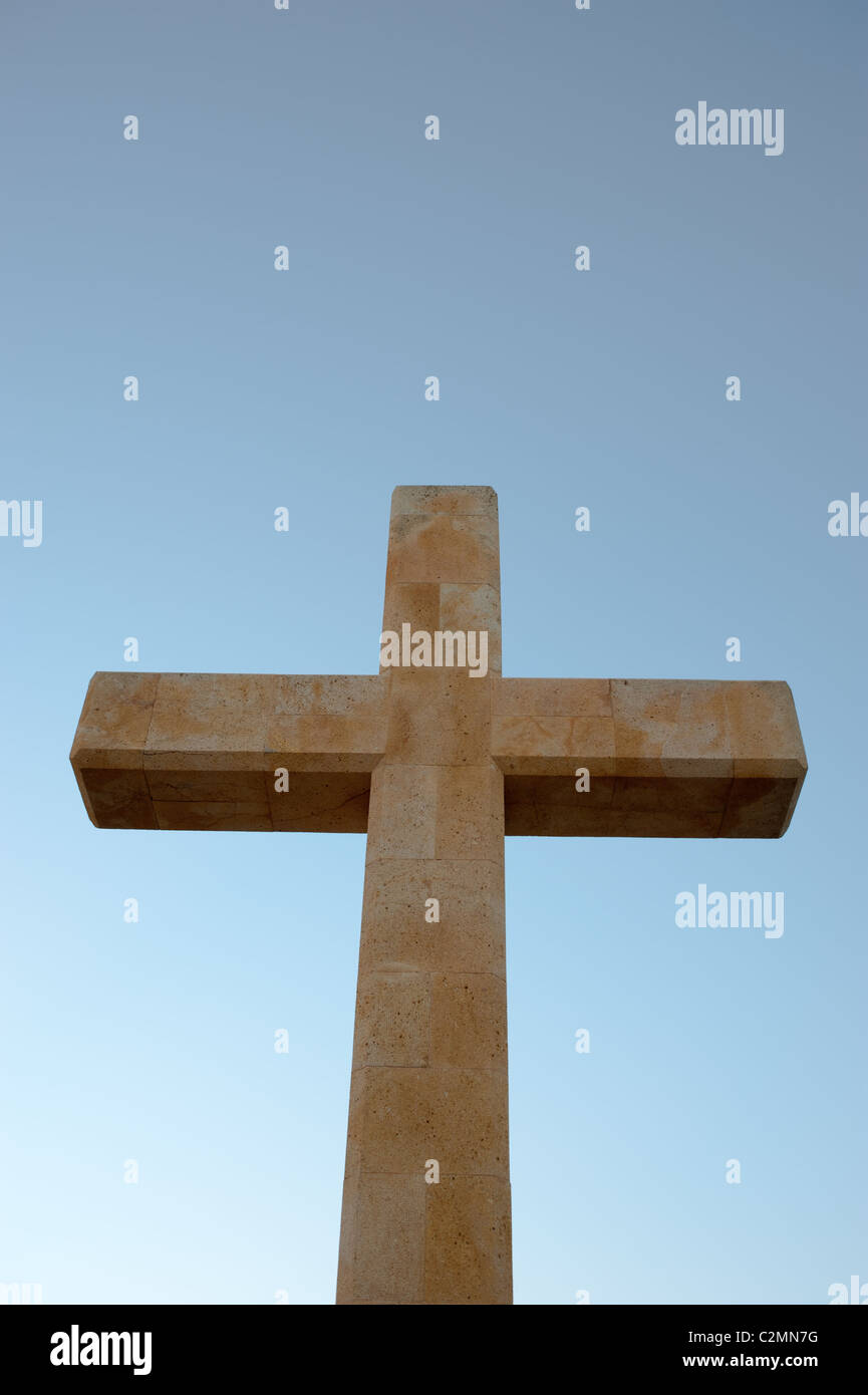 Huge stone cross monument against evening sky Stock Photo - Alamy