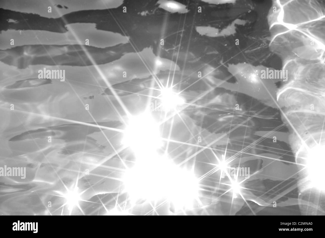 Abstract light reflection on water Stock Photo - Alamy