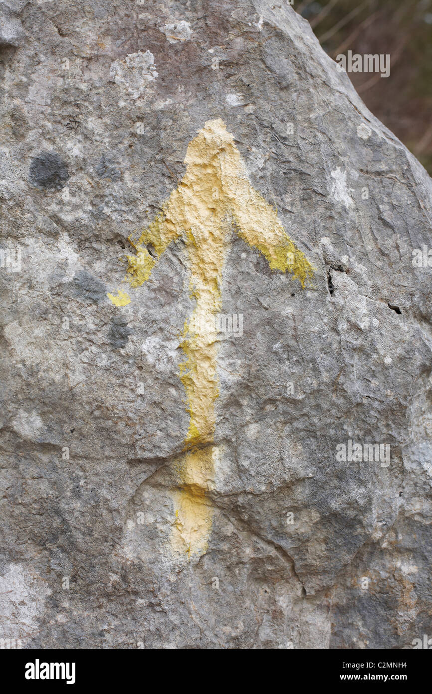 arrow on rock Stock Photo - Alamy
