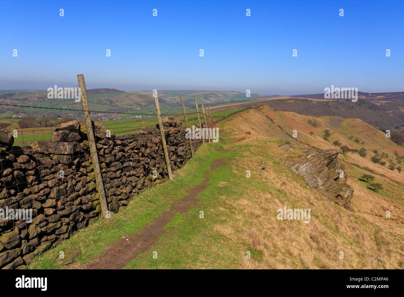 Dry stone wall and fence on moorland above Hayfield, Derbyshire, Peak ...