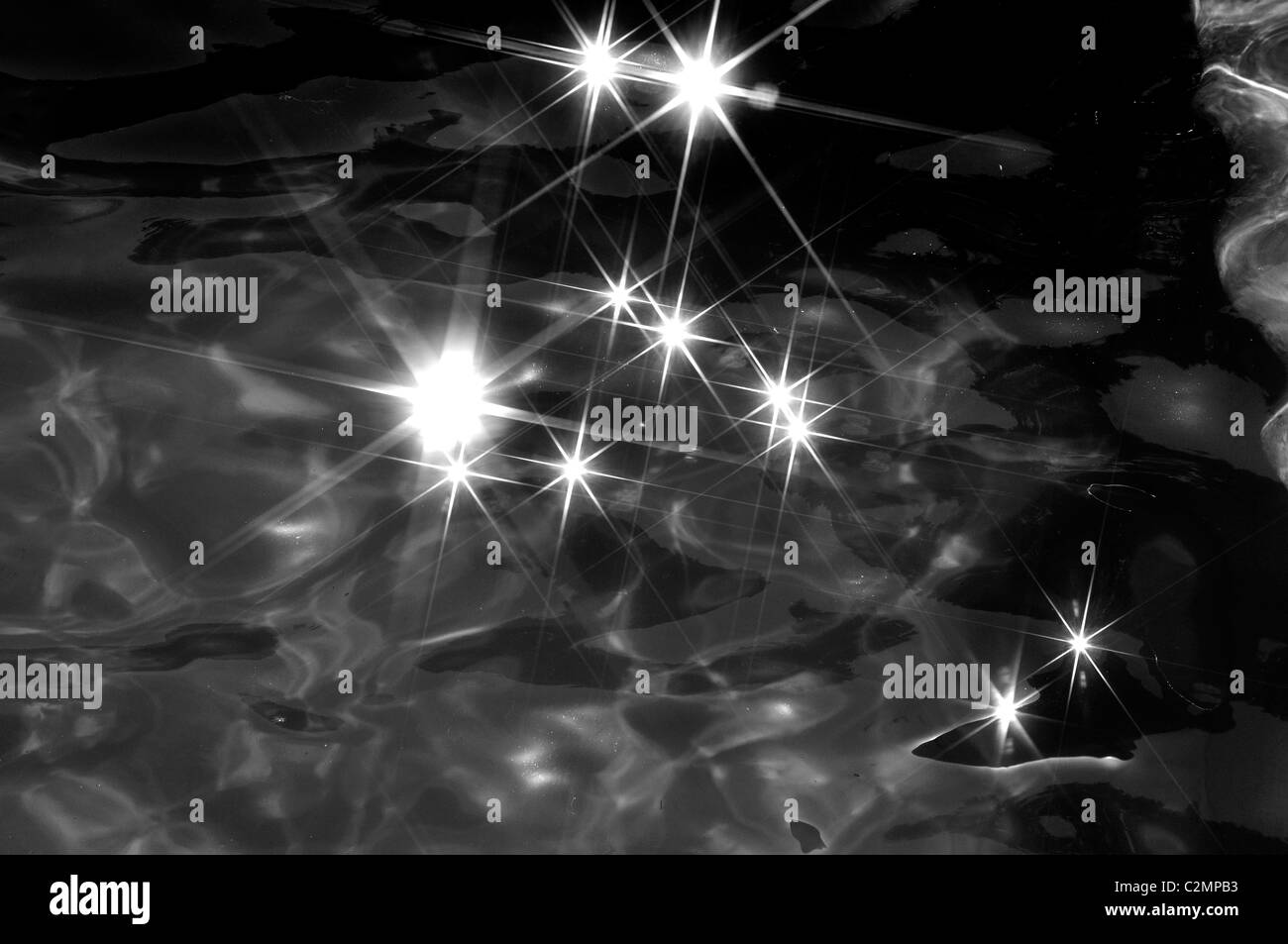 Abstract light reflection on water Stock Photo - Alamy