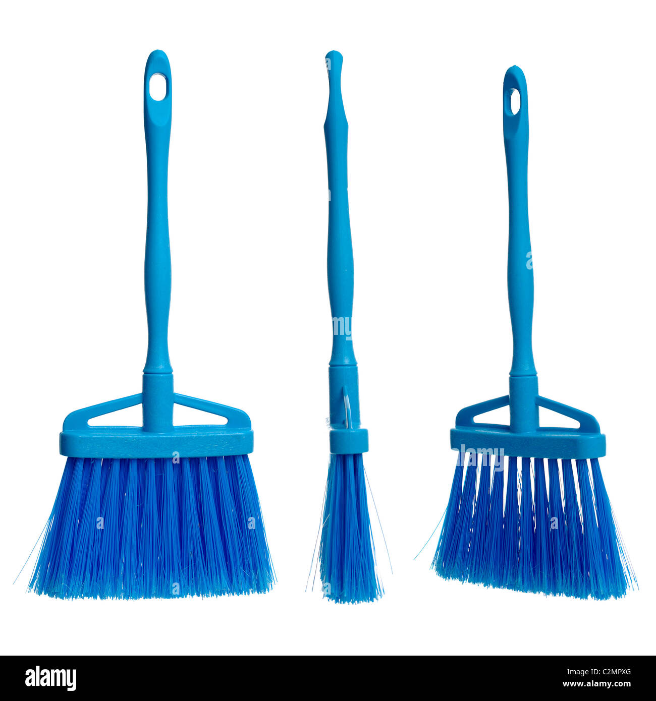 Three plastic blue brooms isolated on white background Stock Photo - Alamy
