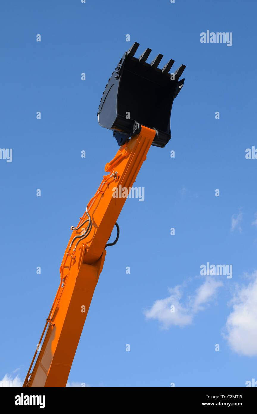 Bulldozer shovel opposite blue sky Stock Photo - Alamy