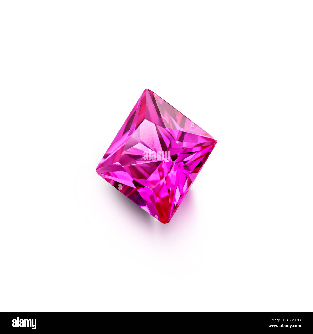 Iso view of pink ruby isolated on white with drop shadow full clipping ...