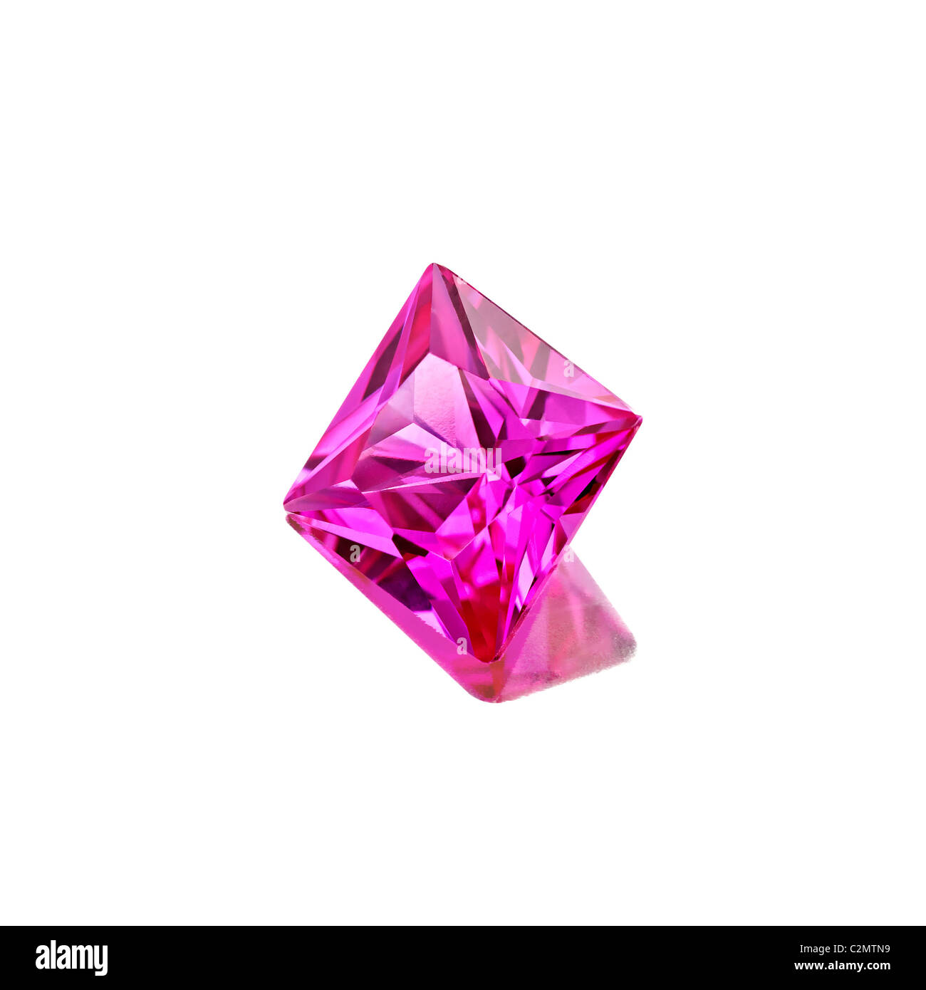 Iso view of pink ruby isolated on white with partial reflection full ...