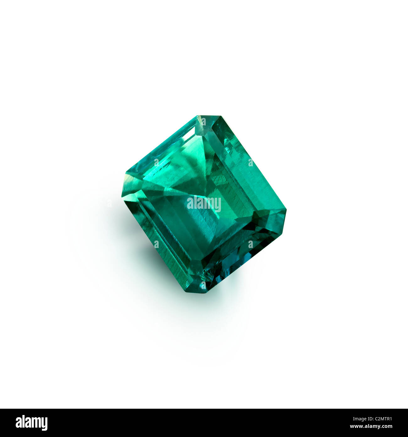 isometric view of emerald isolated on white background with drop shadow ...