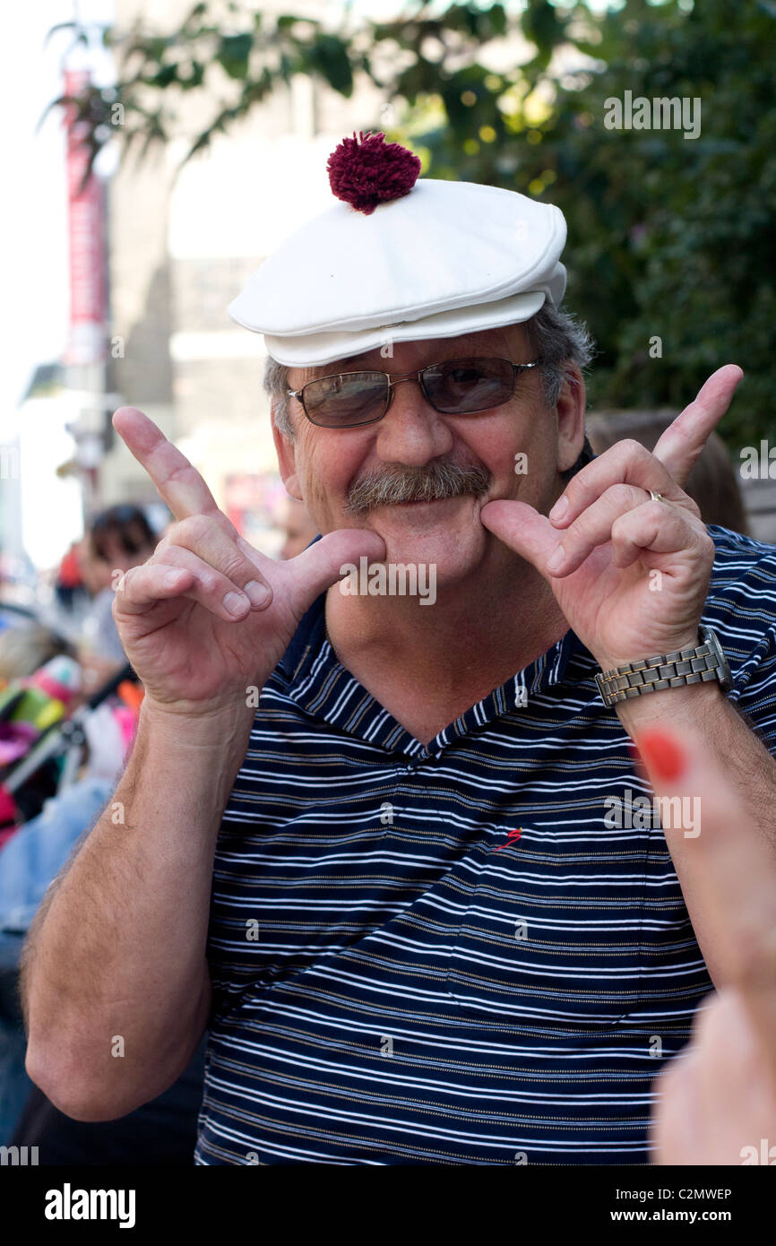 Mature Photographer having fun with his Canon Stock Photo - Alamy