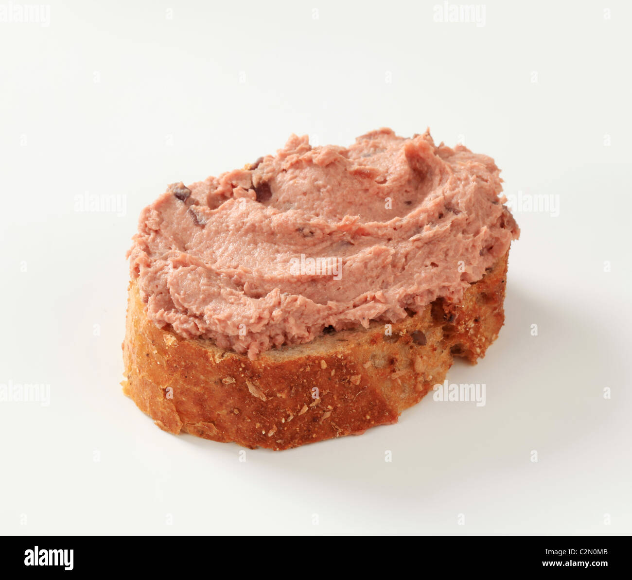 Slice of bread roll and liver pate Stock Photo - Alamy