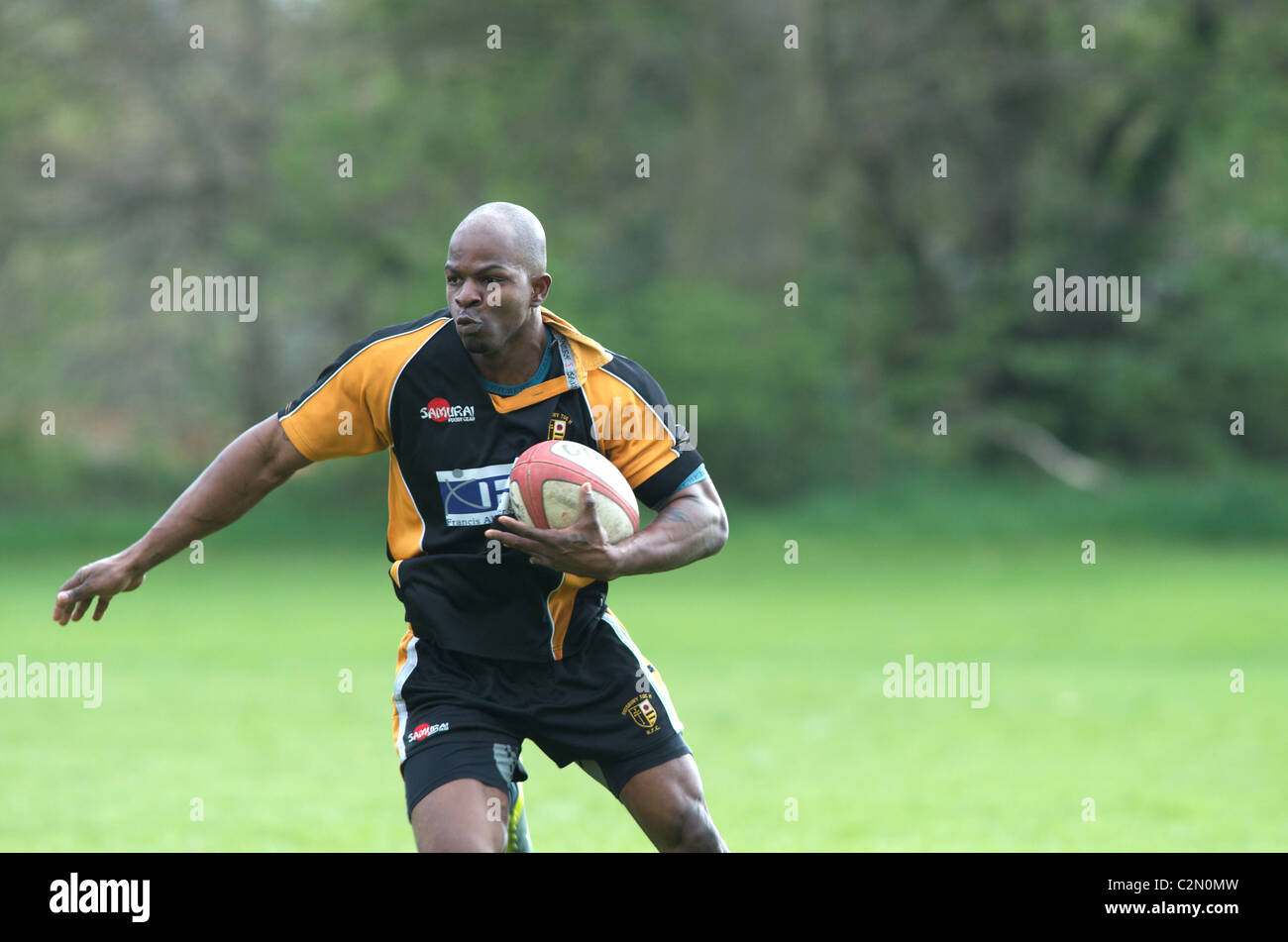 rugby player running with the ball Stock Photo - Alamy