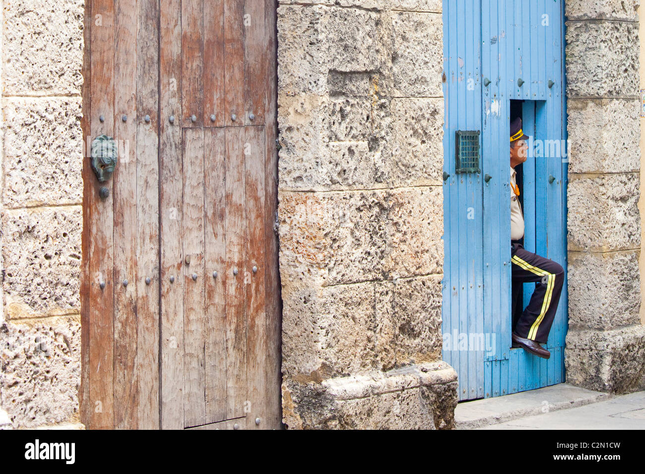 Man guarding door hi-res stock photography and images - Alamy