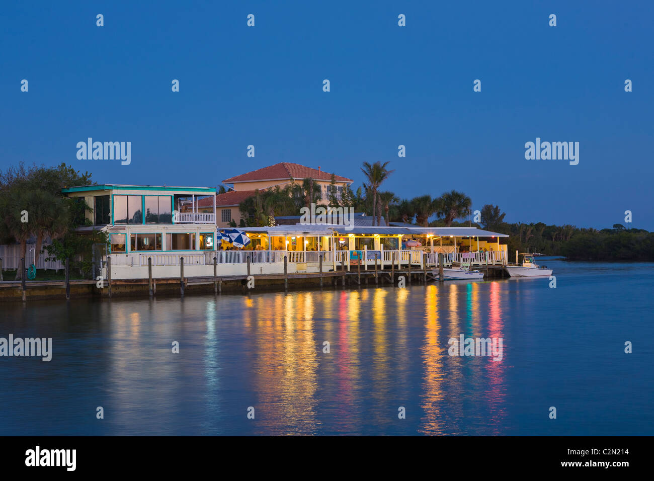 Night lights on Pops Sunset Grill outdoor restaurant on the Gulf ...