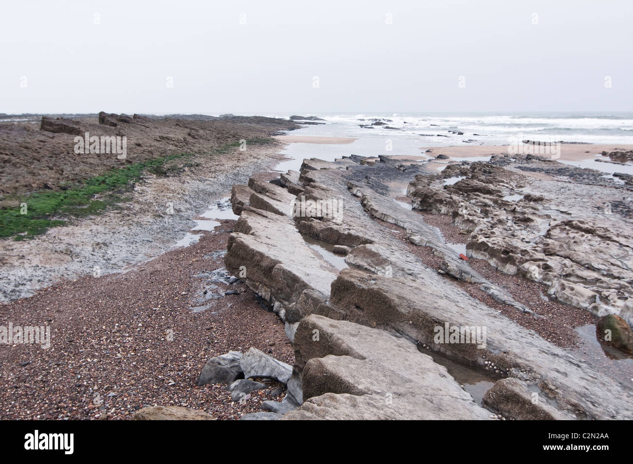 Volcanic magma rock formation at Cocklawburn, Northumberland, England ...