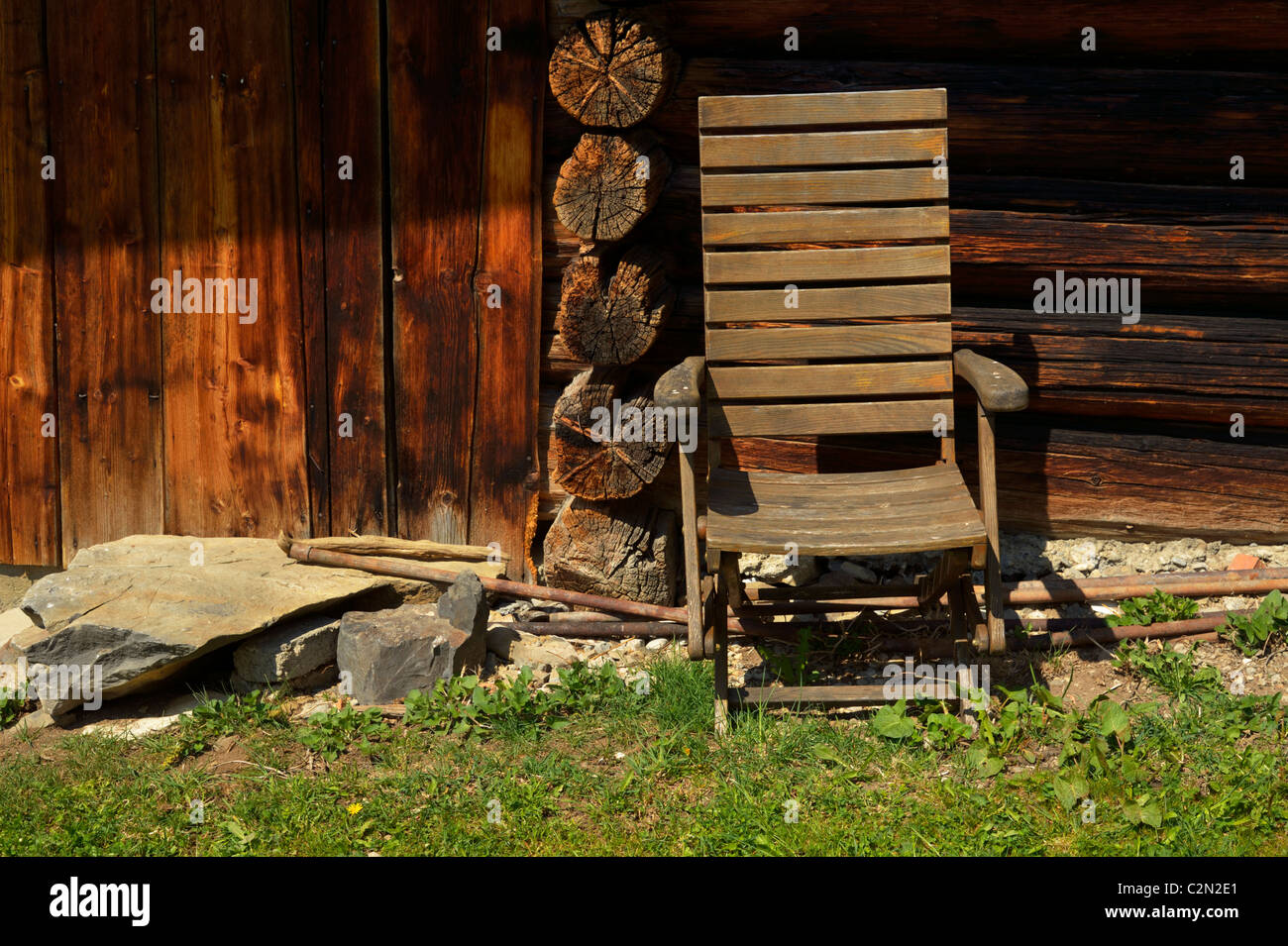 An old wooden folding chair at a mountain hut, Kleinsteg, Liechtenstein ...