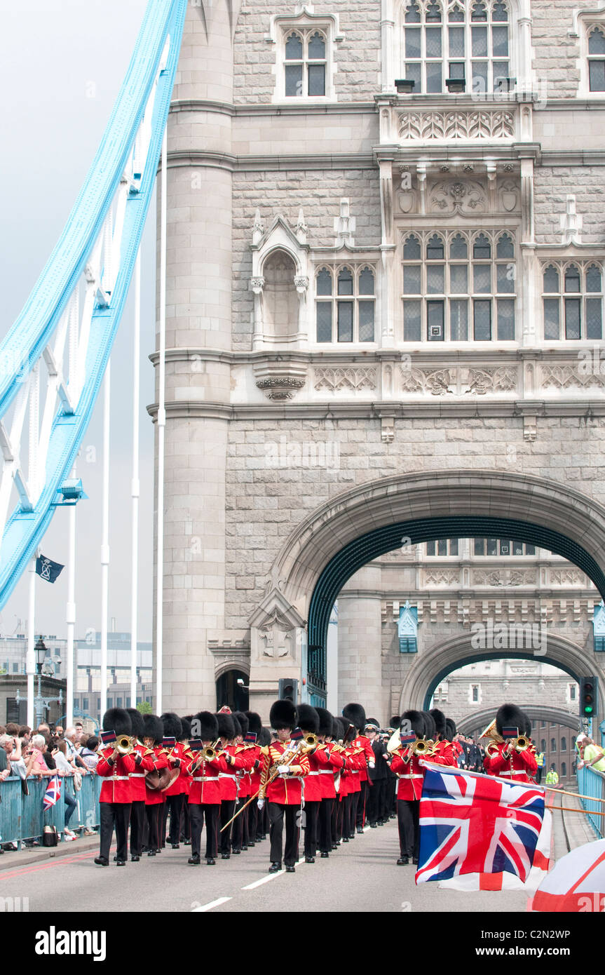 A parade is held to commorate Armed Forces Day at Tower Bridge, London ...