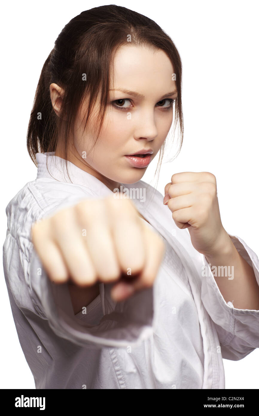 isolated portrait of beautiful martial arts girl in kimono excercising ...