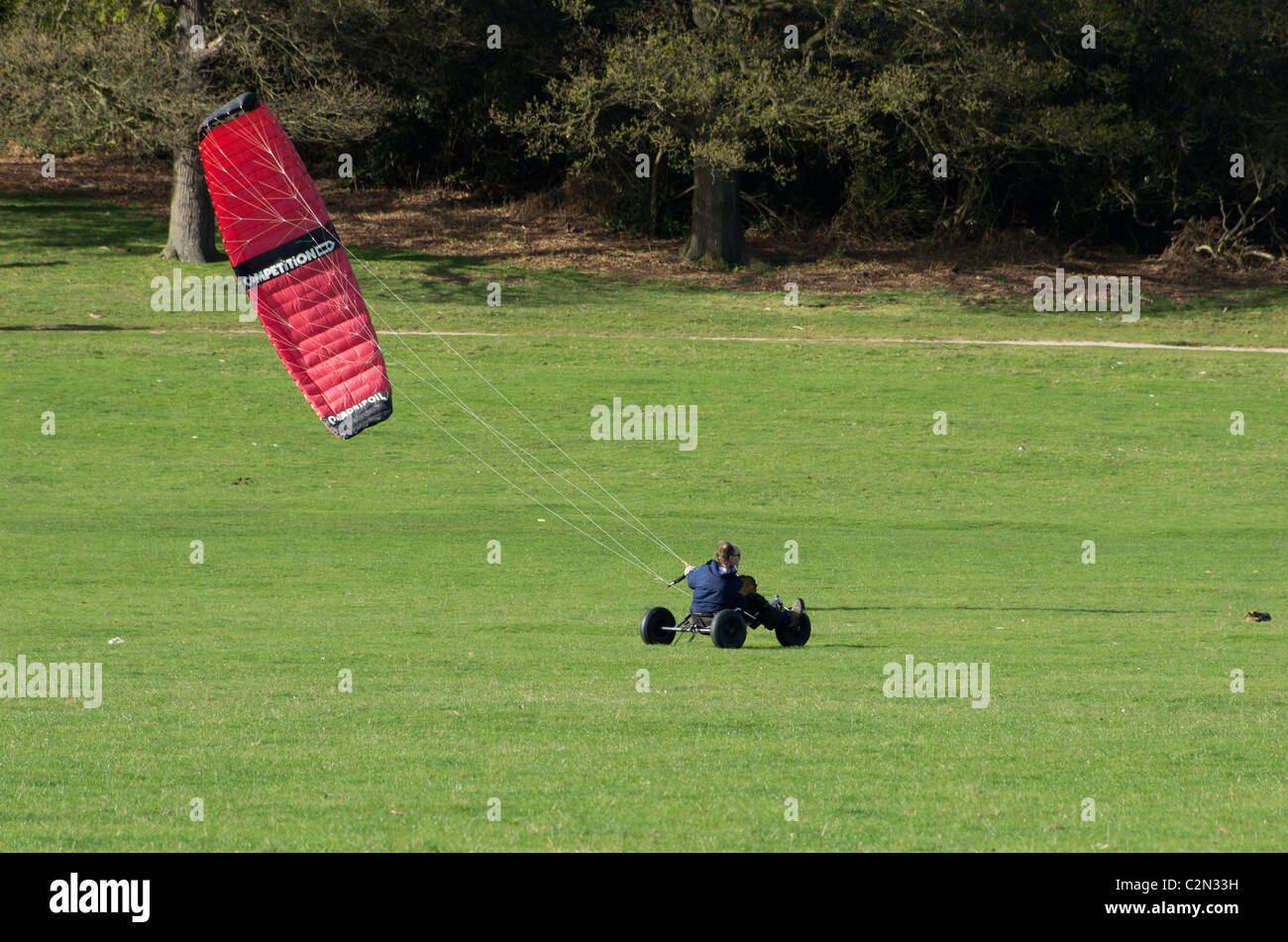 a kite powered trike buggy in action in Richmond park, London Stock ...
