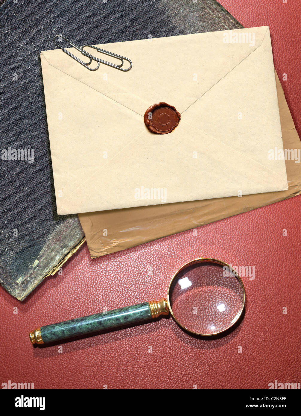dorsal view of military top secret envelope with magnifier Stock Photo ...
