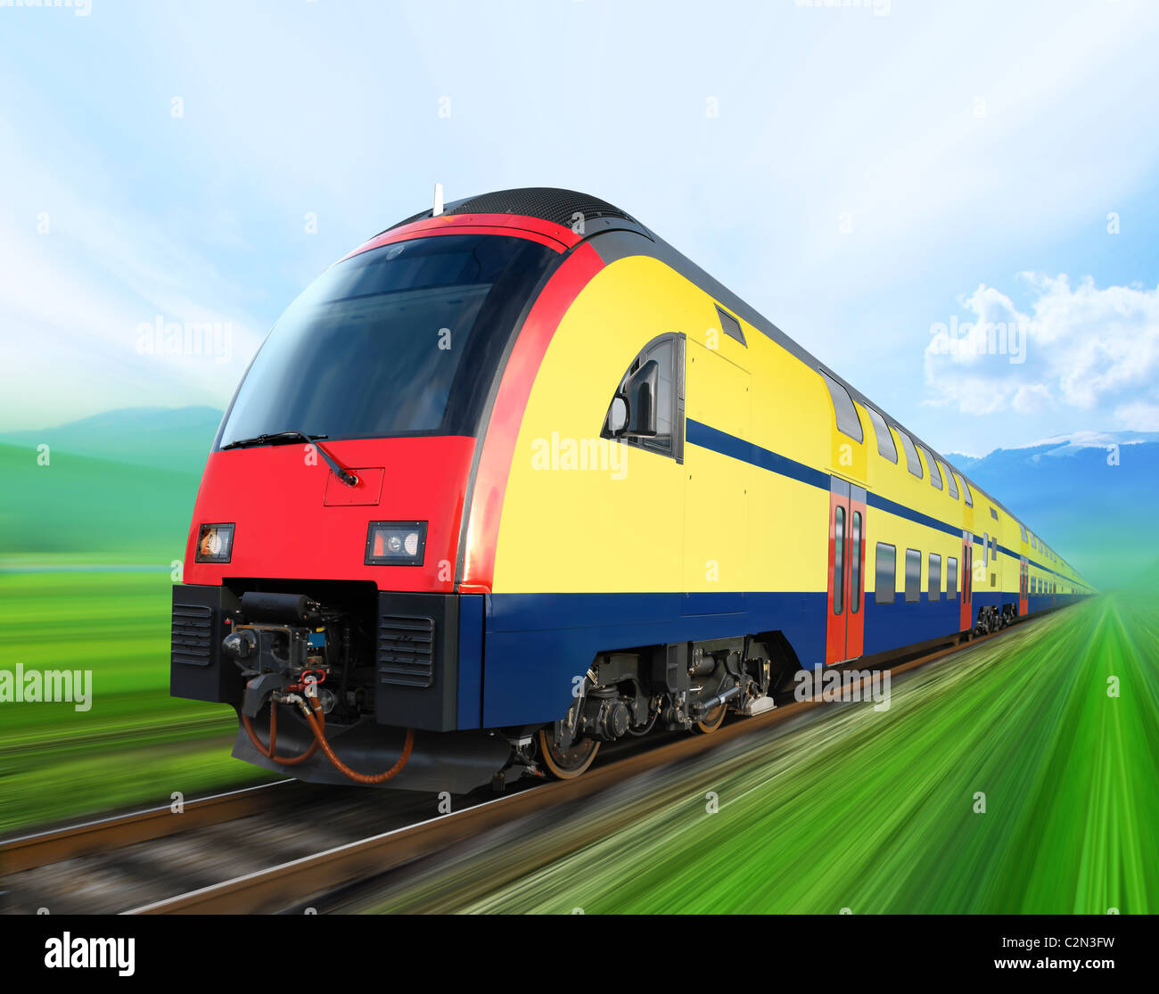 super streamlined train with motion blur moves on countryside Stock ...